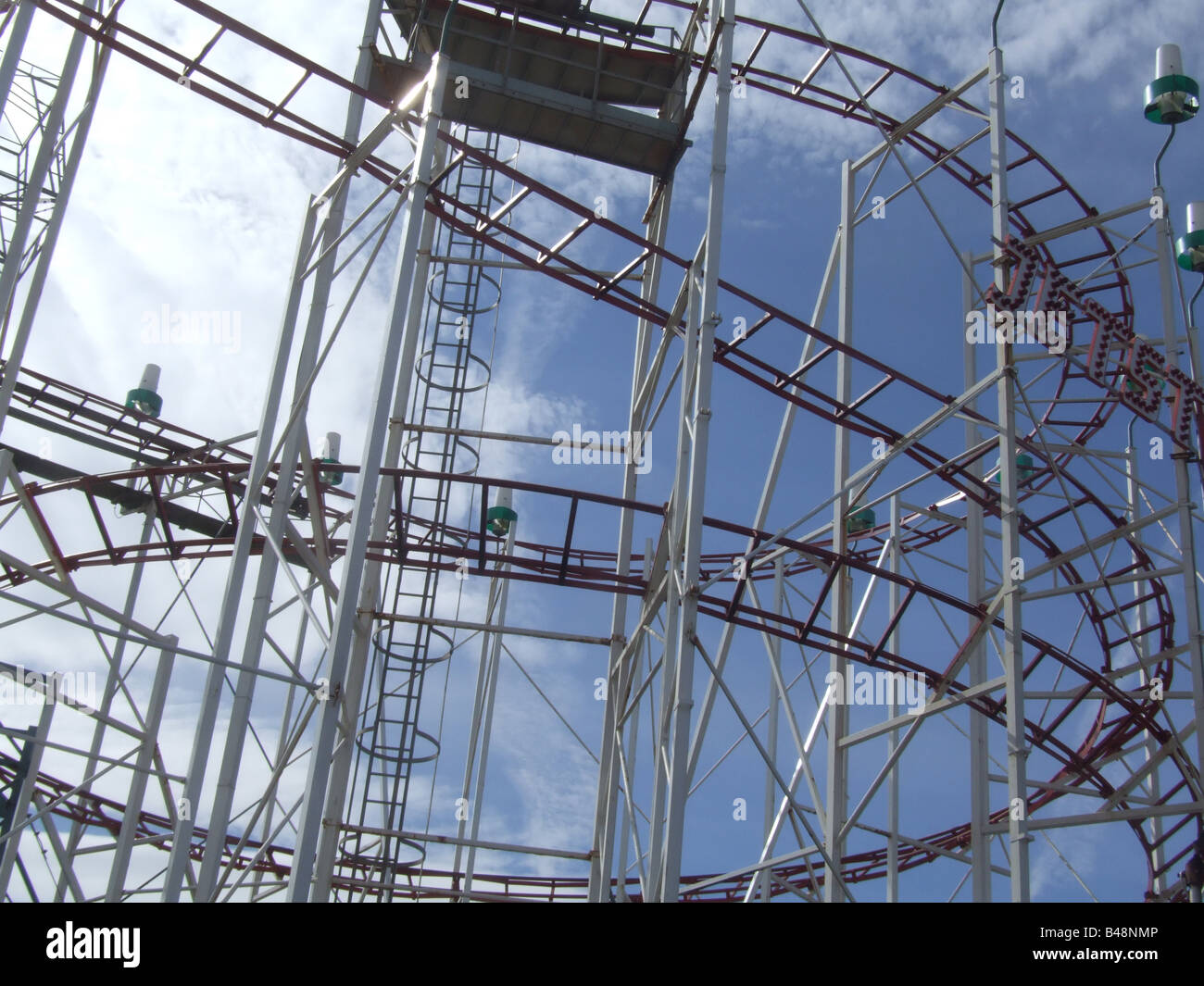 rollercoaster ride in fairground in sun Stock Photo - Alamy