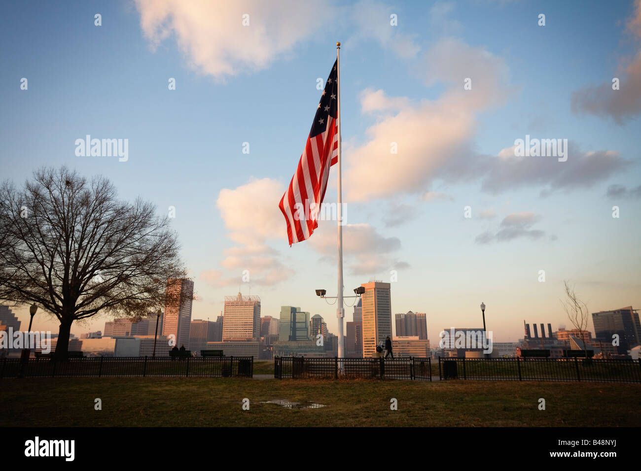 American flag and Baltimore skyline as seen from Federal Hill Park ...