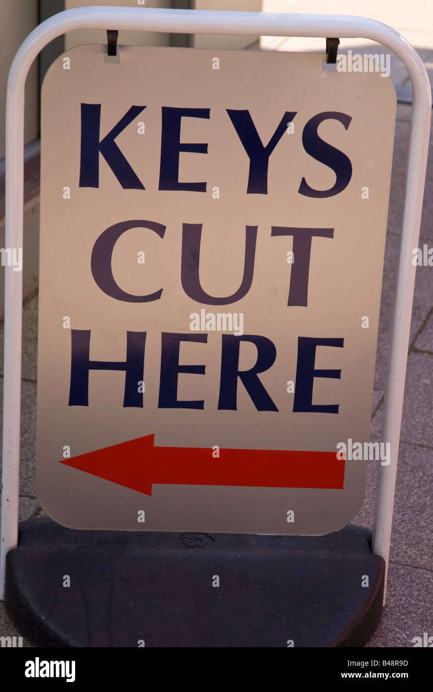 Keys cut here sign hi-res stock photography and images - Alamy