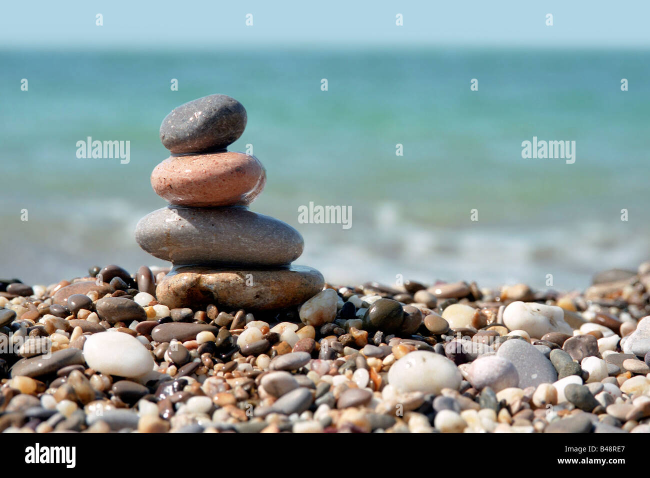 Stone stack on beach clear hi-res stock photography and images - Alamy