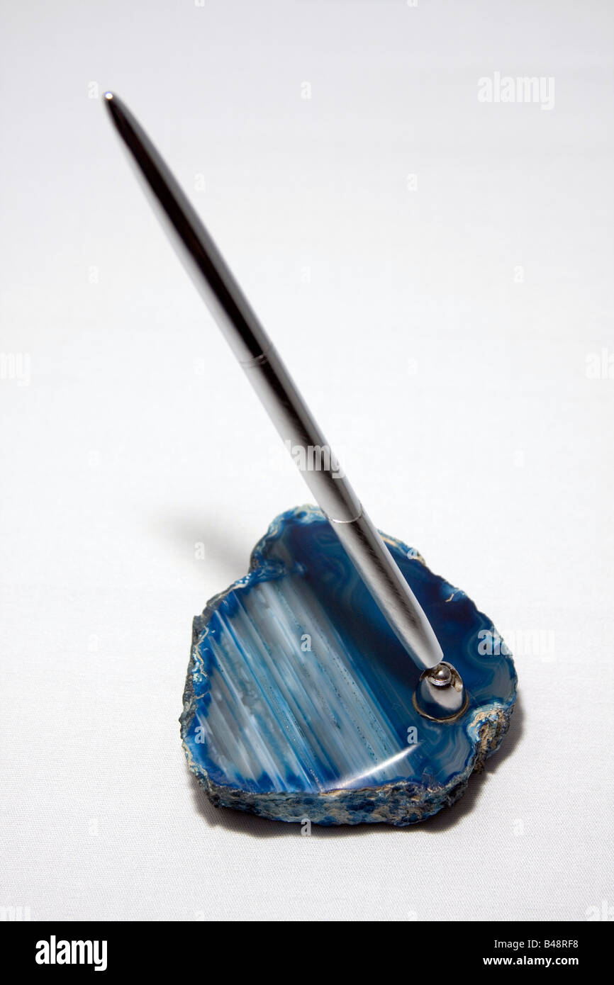 Silver pen on a crystal stand Stock Photo - Alamy