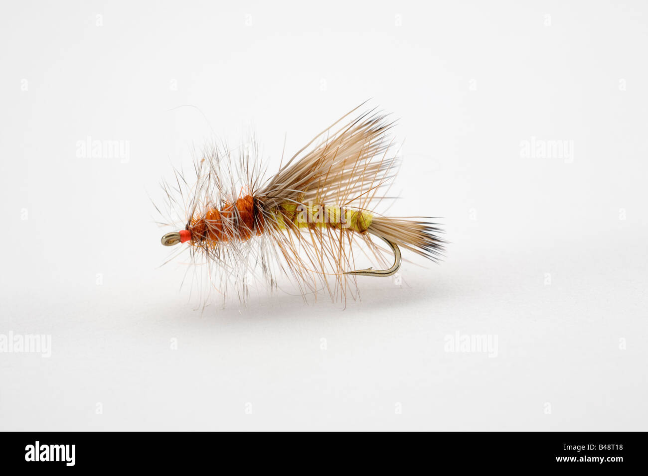 Stimulator artificial fishing fly Stock Photo - Alamy