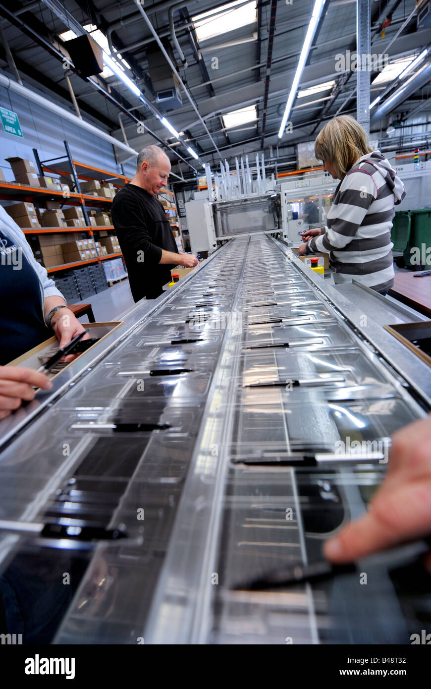 Parker Pen factory in Newhaven, Sussex, UK. the assembly line of the ...