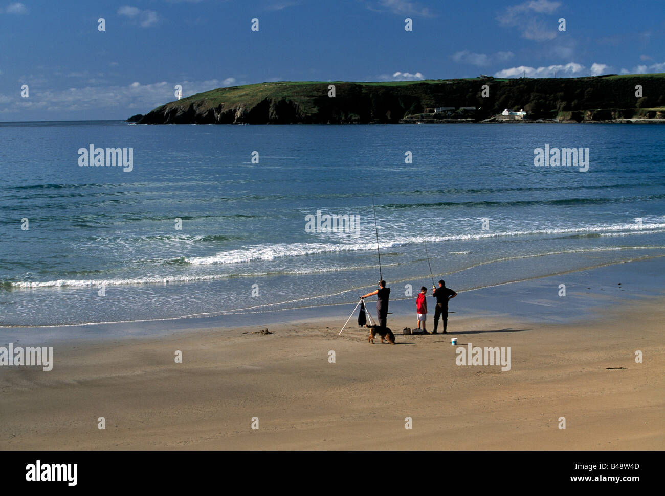 sea anglers on the edge of a calm atlantic sea, beauty in nature Stock ...
