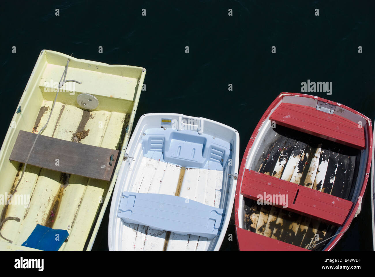 Rowing boats in a harbor Stock Photo - Alamy