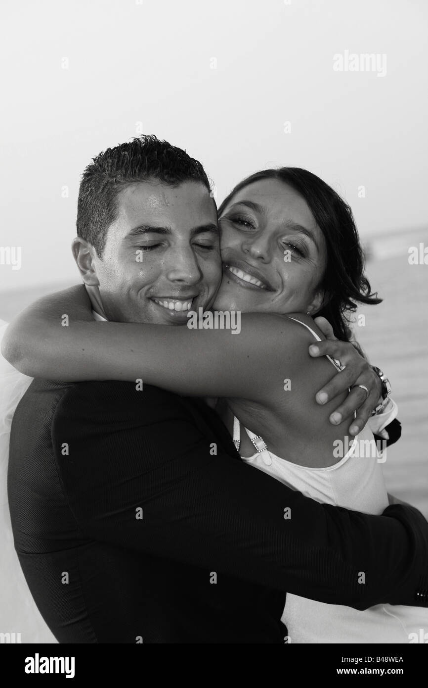 Bride and groom ebracing hi-res stock photography and images - Alamy