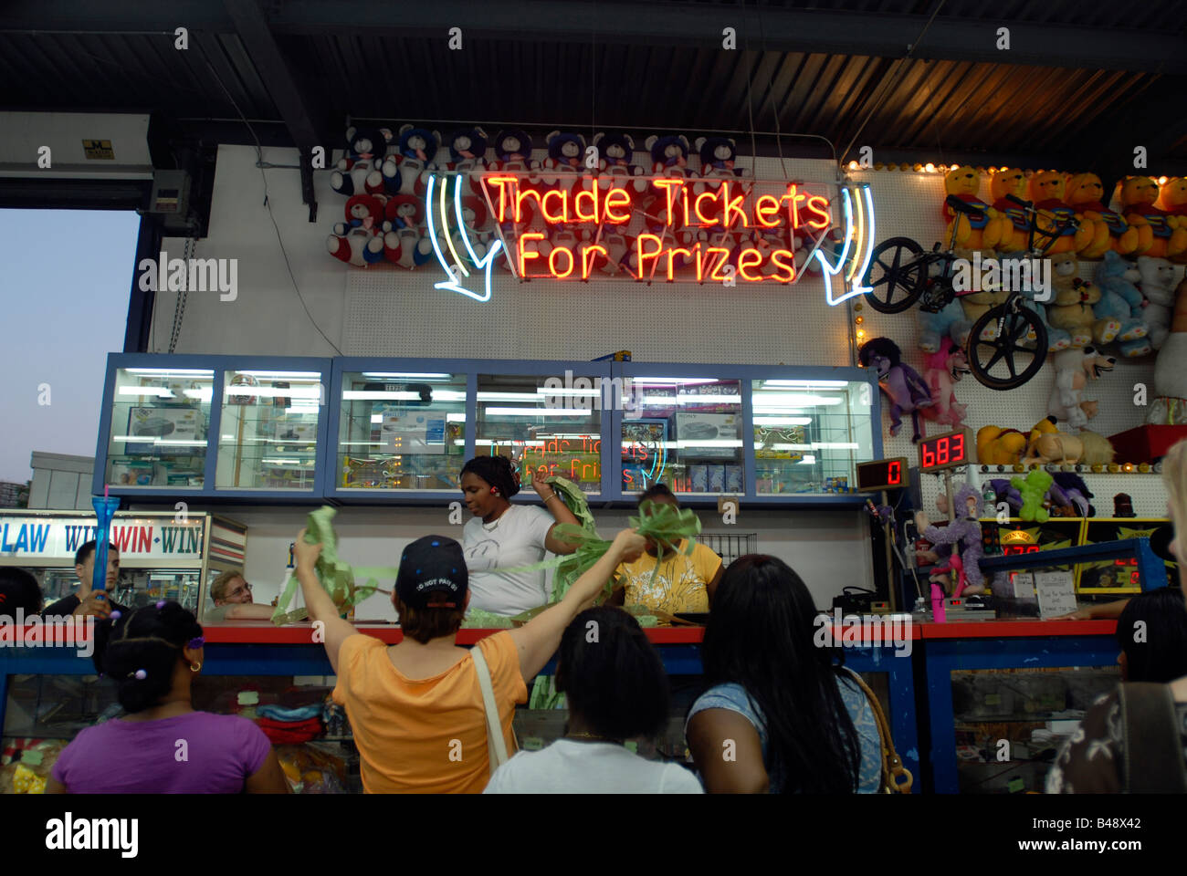 Winners collect their prizes at an arcade in Astroland in Coney Island ...