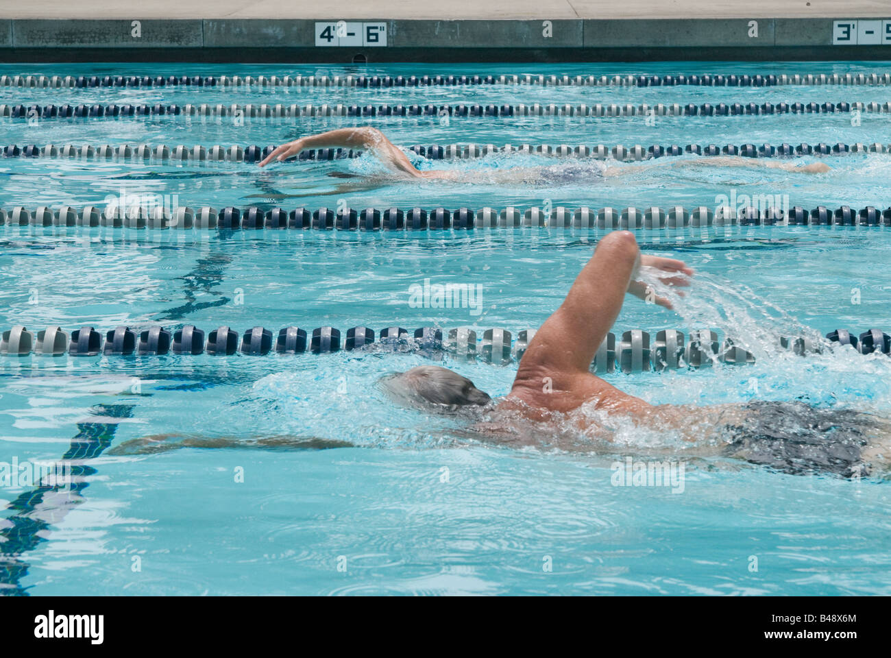 two people swimming in the pool at Los Banos del Mar in Santa Barbara ...