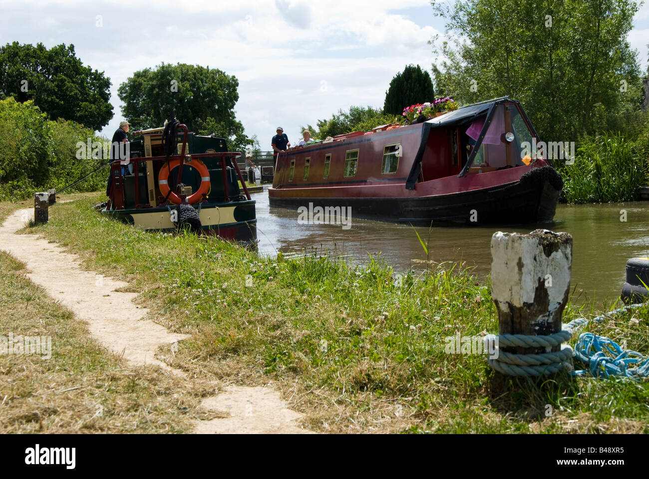 A view from the towpath near Nell Bridge lock as a narrow boat passes ...
