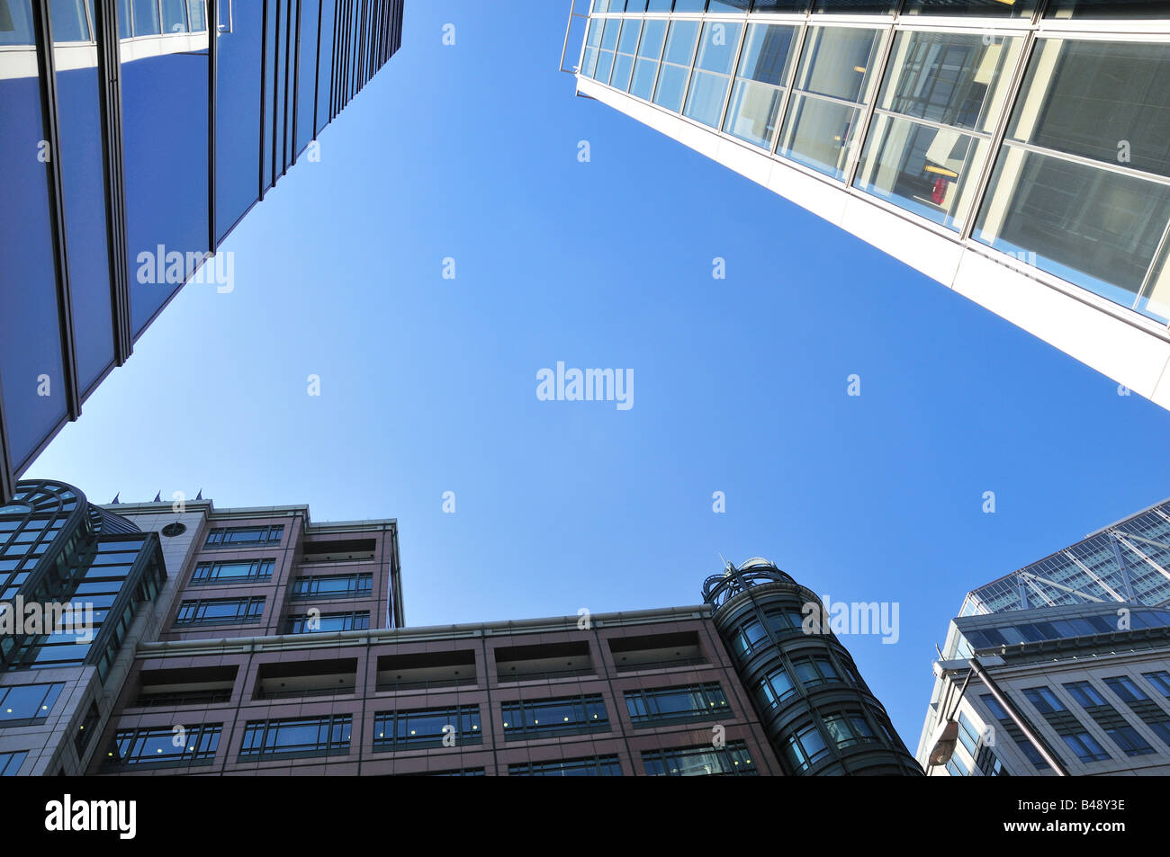 Office buildings - Modern architecture in City of London with blue sky ...