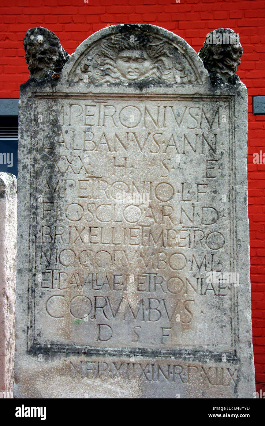 Roman Gravestone - in front of a red wall Stock Photo - Alamy