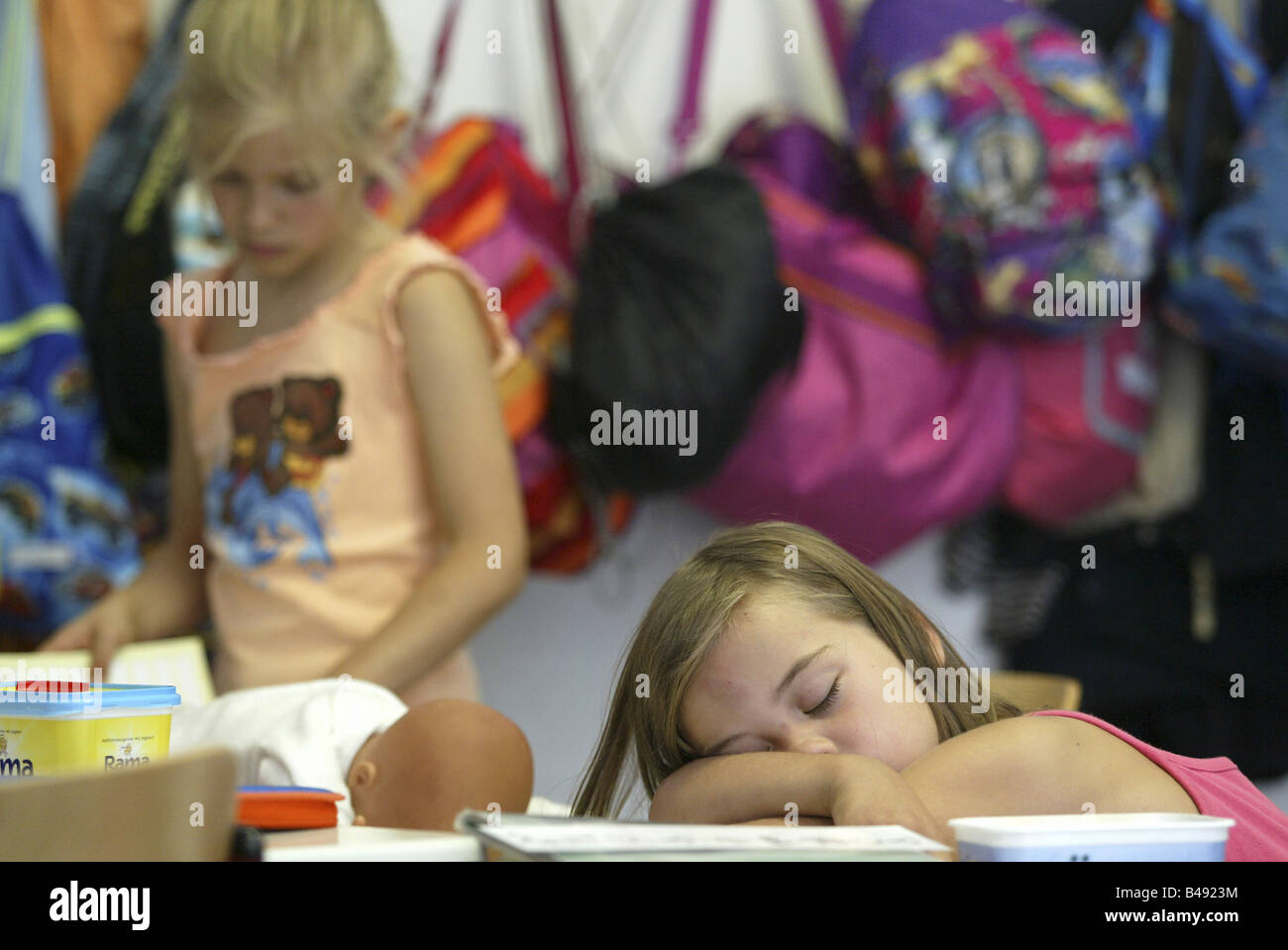 Little girl sleeping during class, Berlin, Germany Stock Photo - Alamy