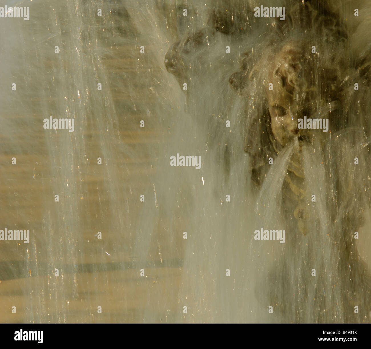 Angel statue behind its water curtain Paris fountains Stock Photo - Alamy