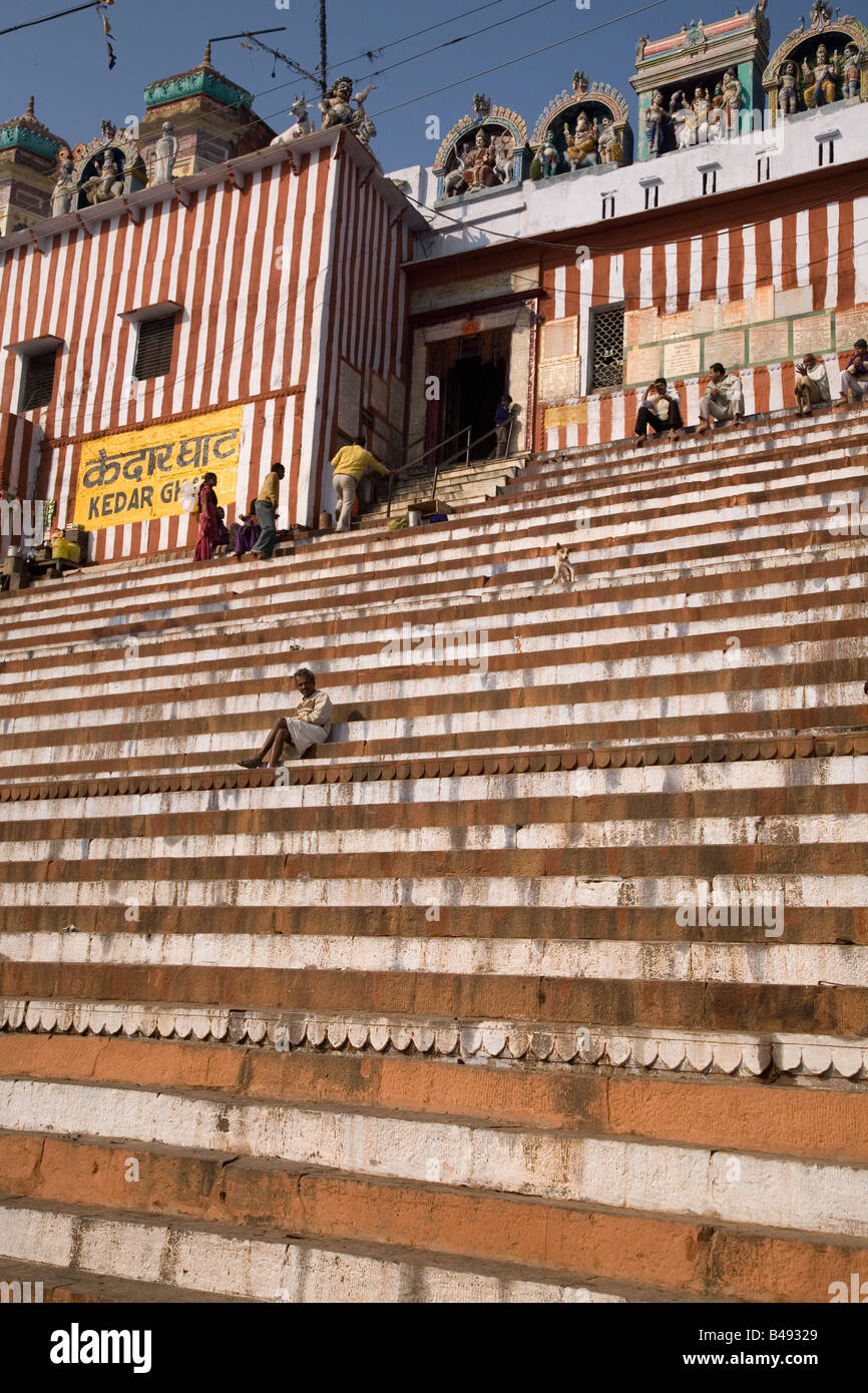 The red and white steps of the Kedar Ghat in the city of Varanasi ...