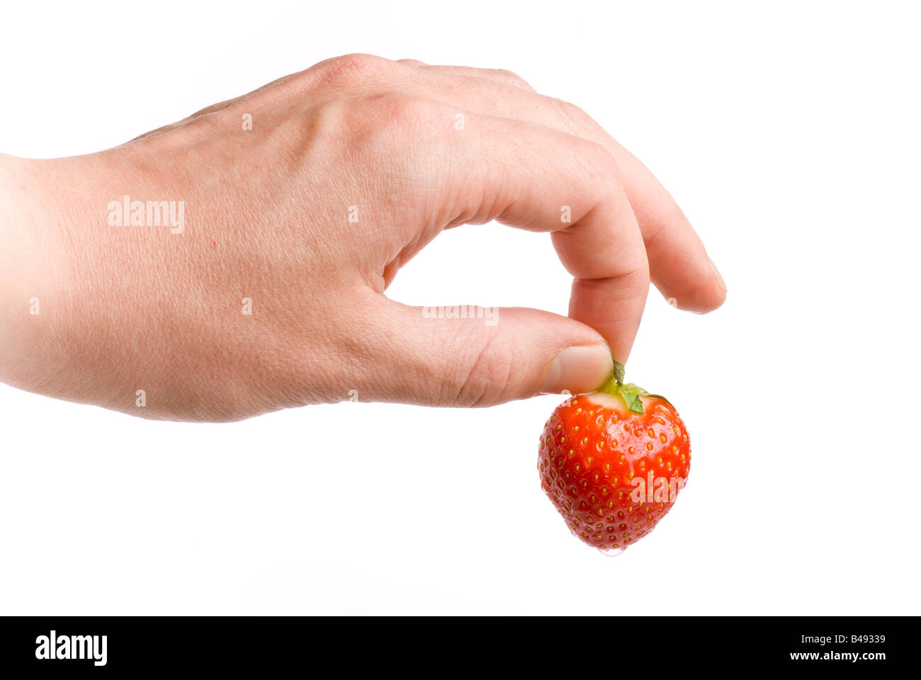 Hand picked strawberry hi-res stock photography and images - Alamy