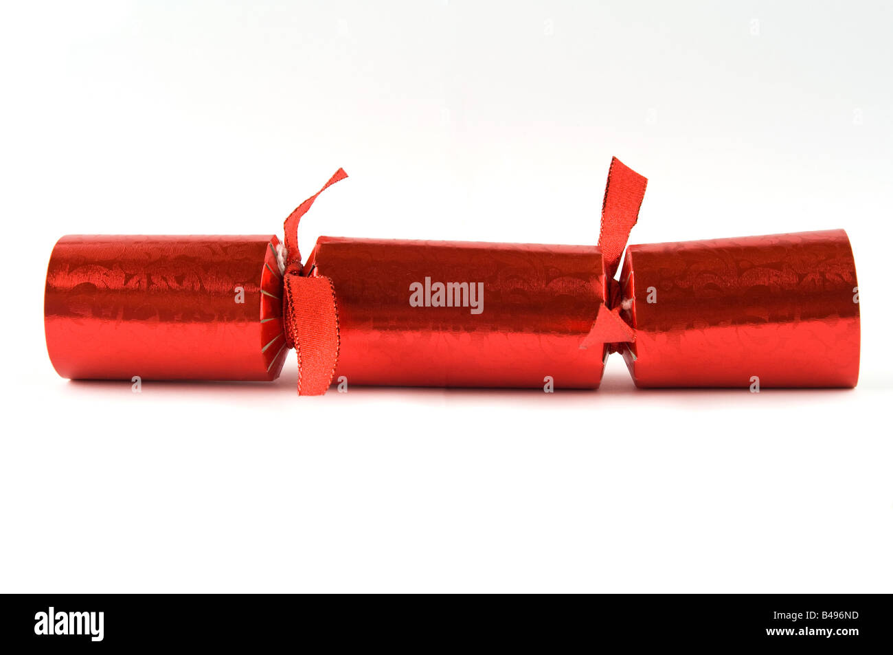 Red Christmas cracker on white background Stock Photo - Alamy