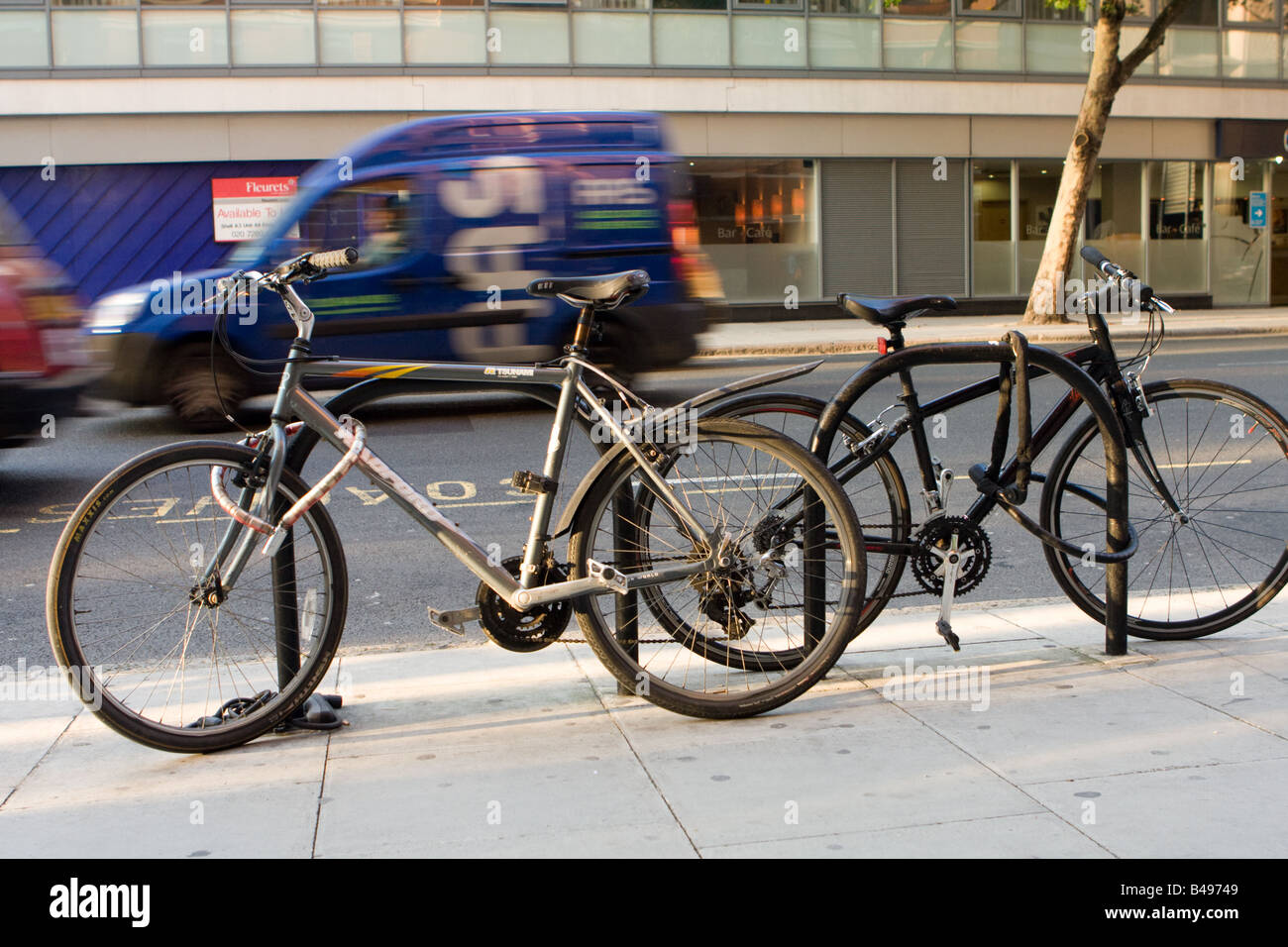 Chained bicycles on the street Stock Photo - Alamy