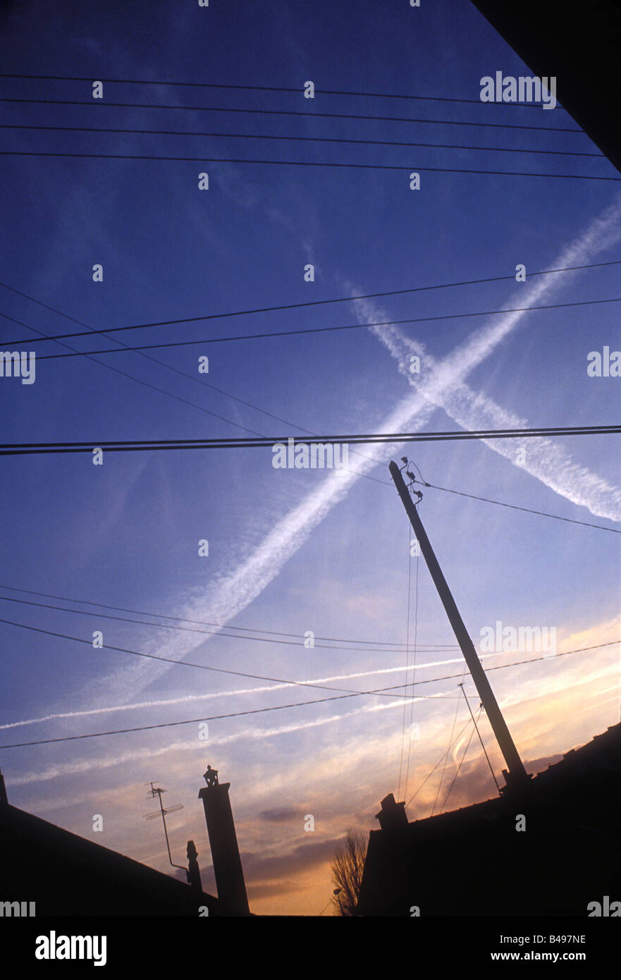 Jet streams in the sky Stock Photo - Alamy