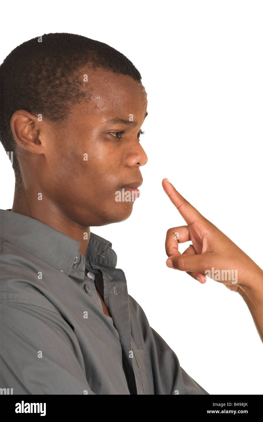 Finger pointing at a sweating businessman Stock Photo - Alamy