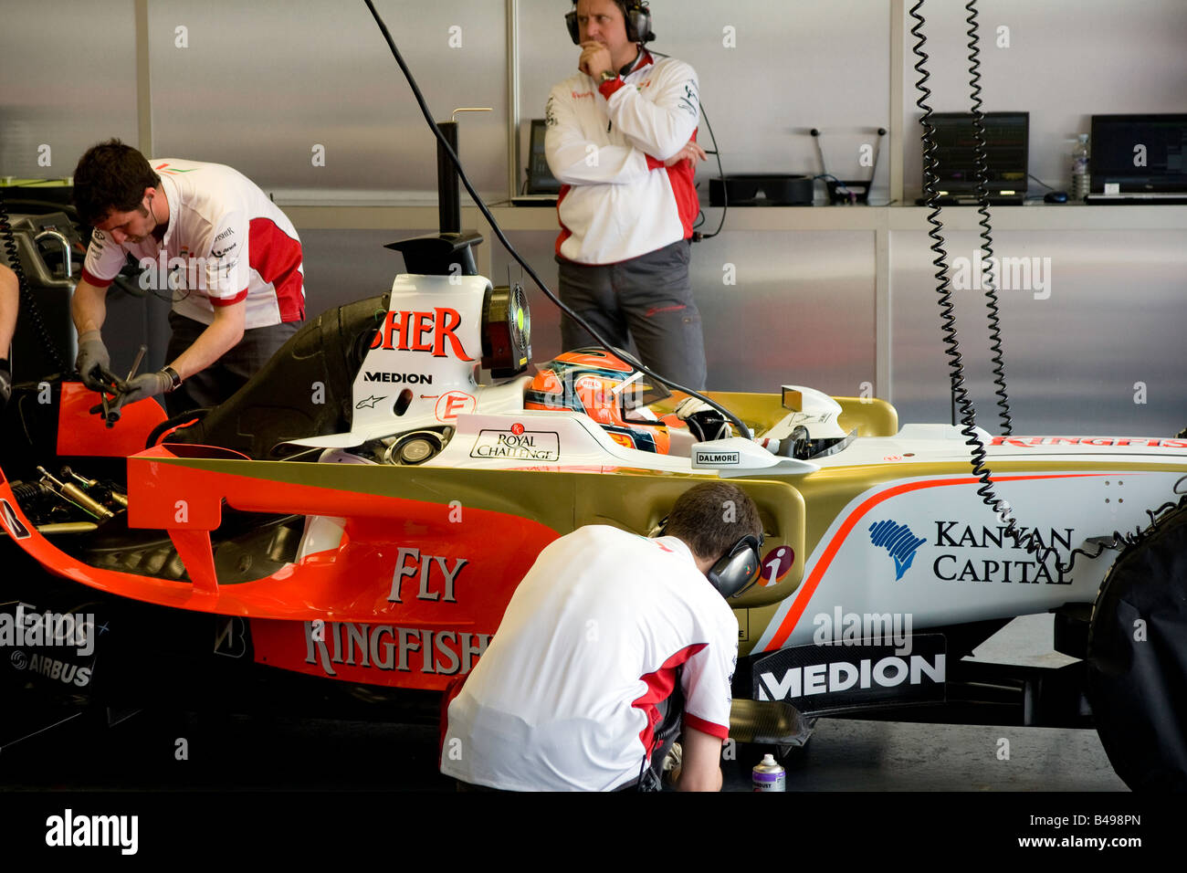 Force India race car in garage at Silverstone testing Stock Photo - Alamy