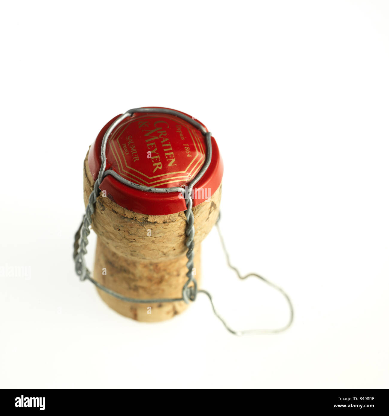 Champagne cork with metal crown wire cage Stock Photo - Alamy