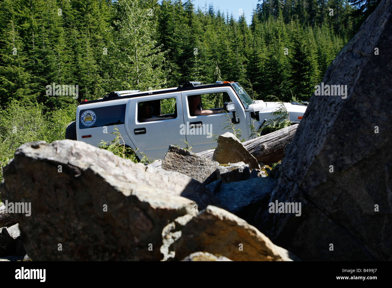hummer driving a dirt road Whistler BC Stock Photo - Alamy