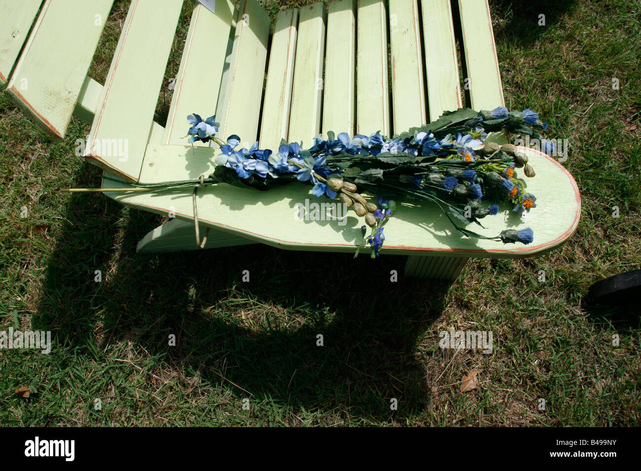 bunch of flowers on bench in park Stock Photo - Alamy