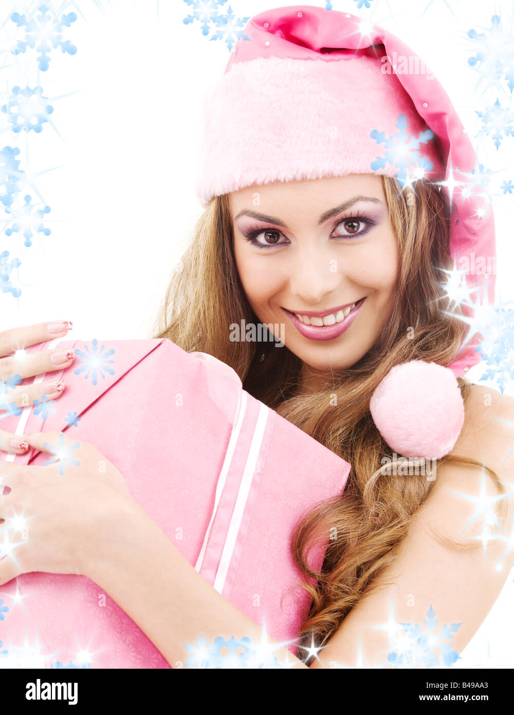picture of cheerful santa helper girl with gift box Stock Photo - Alamy