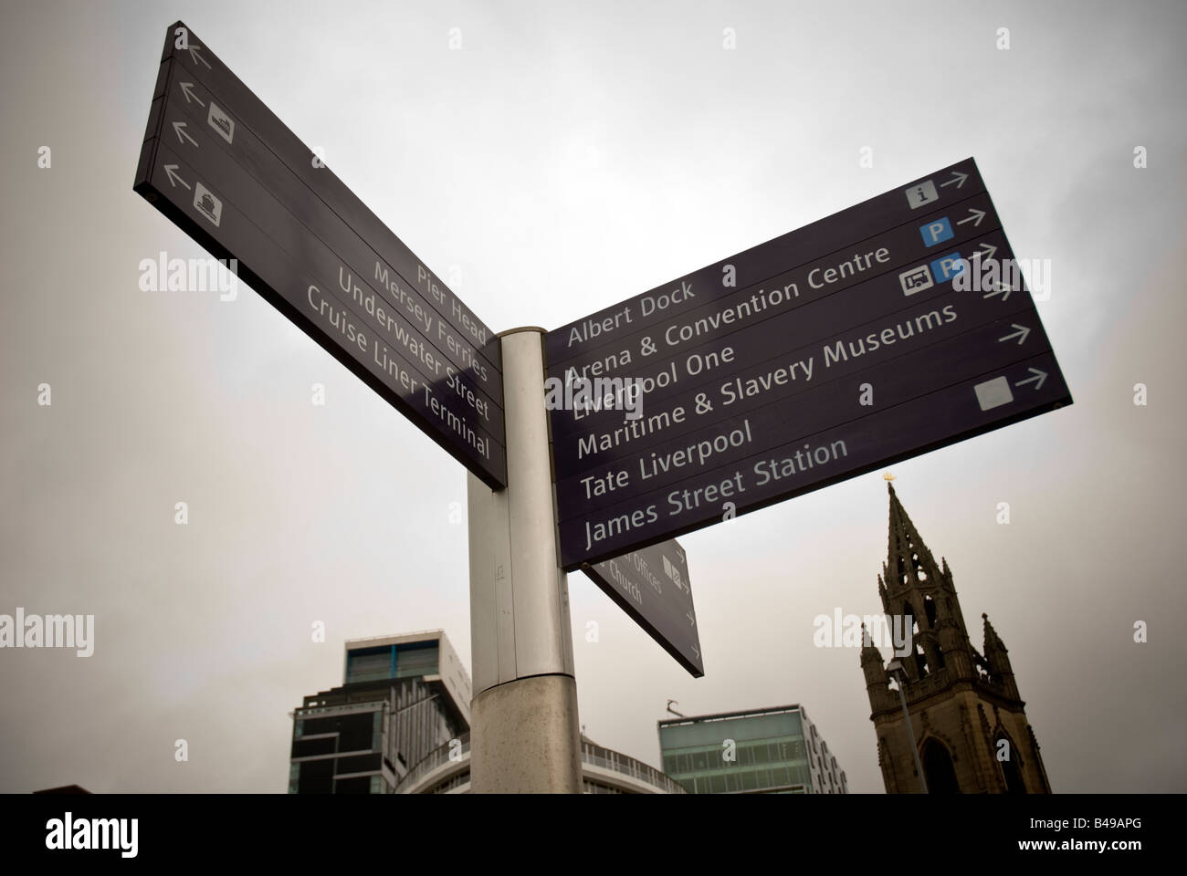 Liverpool pier head waterfront tourist signs with The Atlantic Tower ...