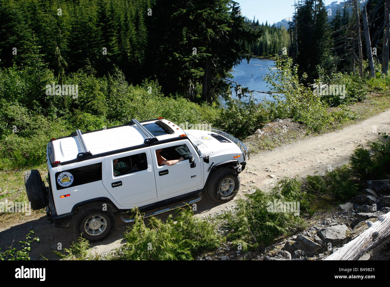 hummer driving a dirt road Whistler BC Stock Photo - Alamy