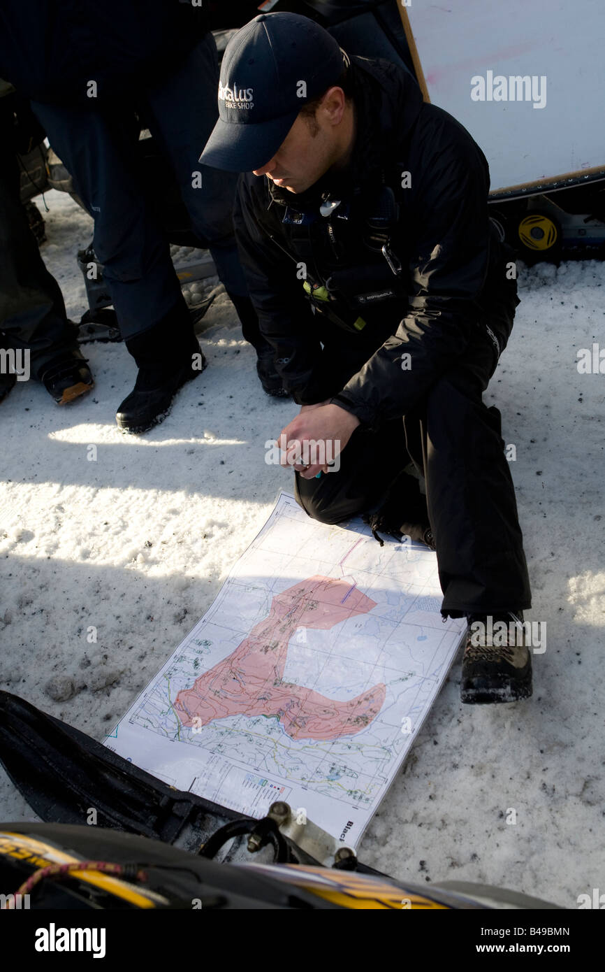 man checking map Stock Photo - Alamy
