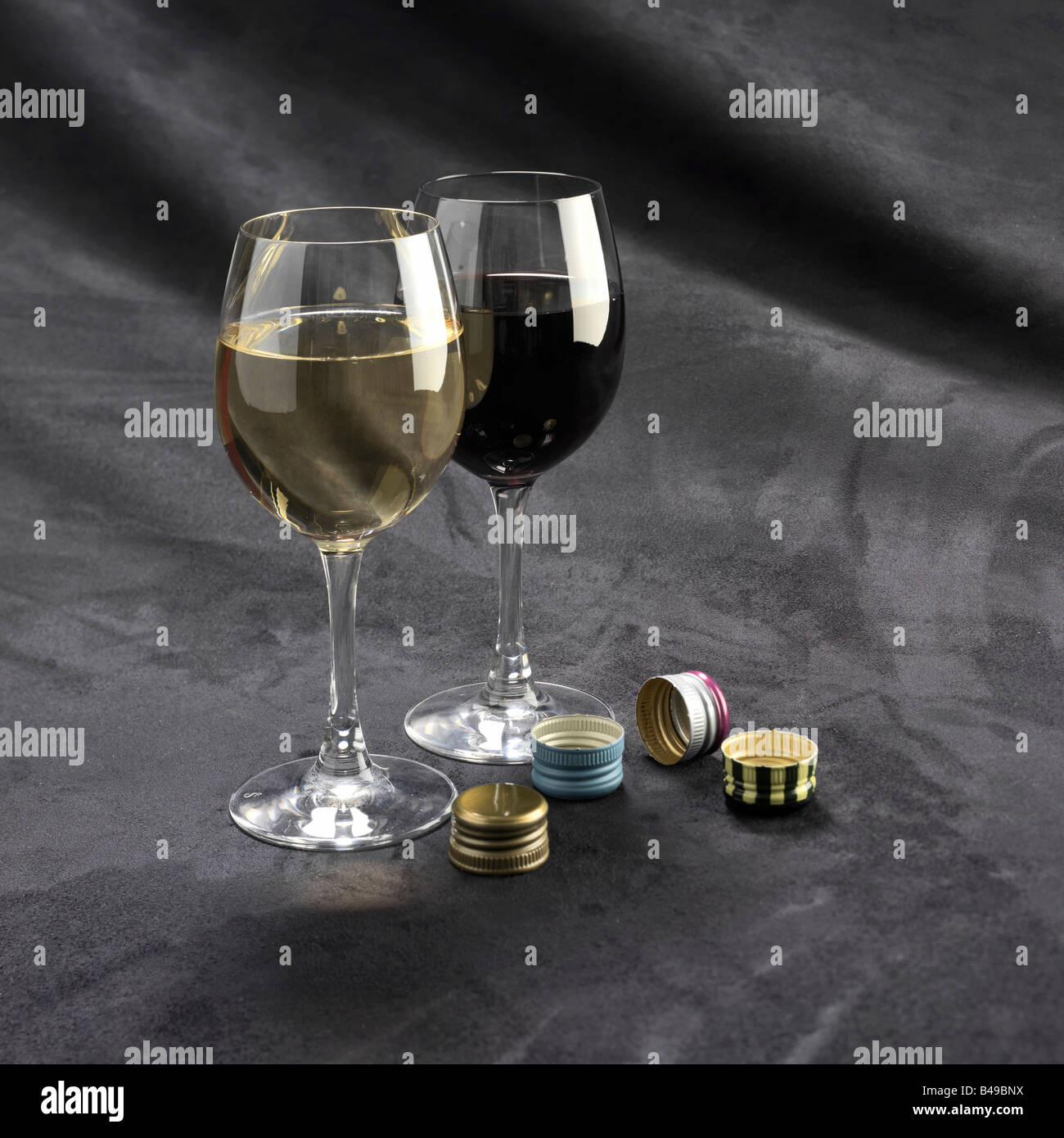 Red & White wine glasses & stelvin screw cap closures Stock Photo - Alamy
