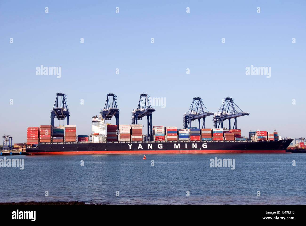 Container Ship Being Unloaded Stock Photo - Alamy