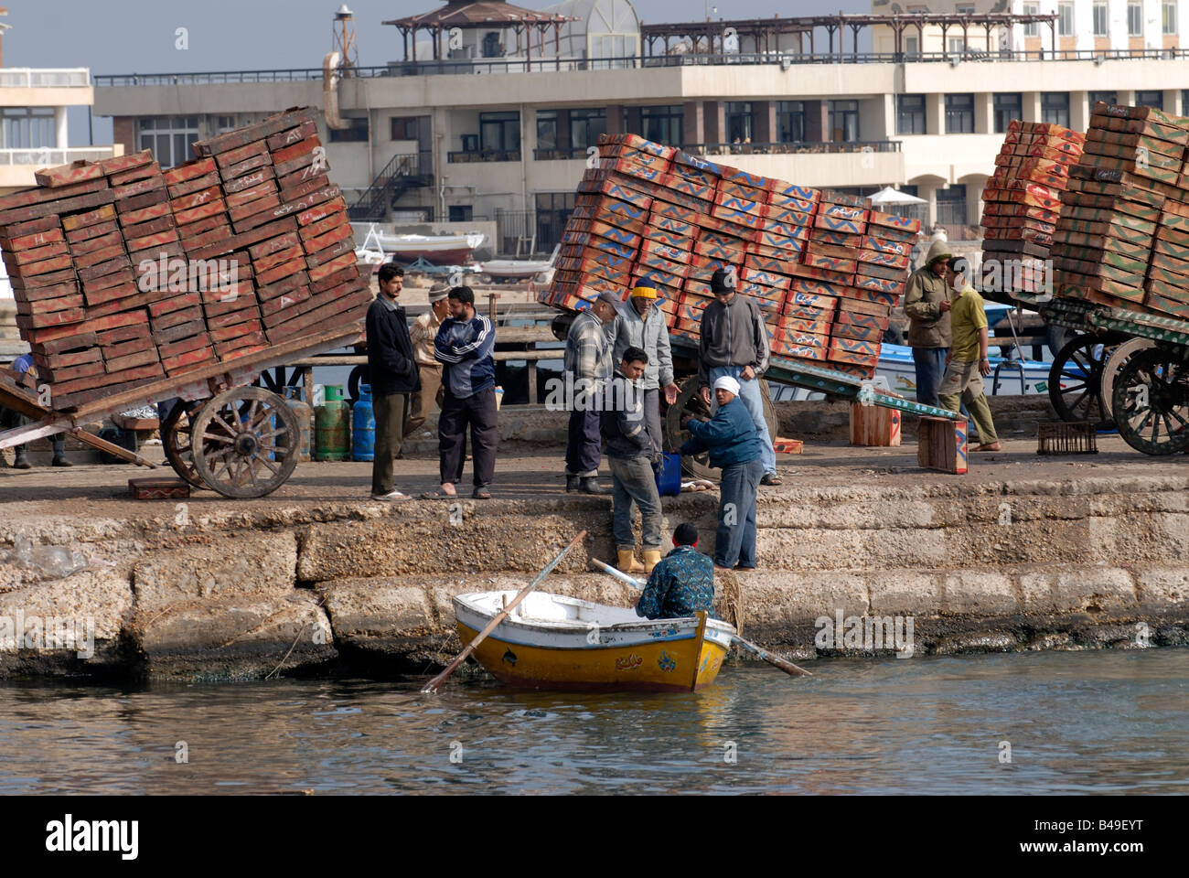 Men unloading hi-res stock photography and images - Alamy