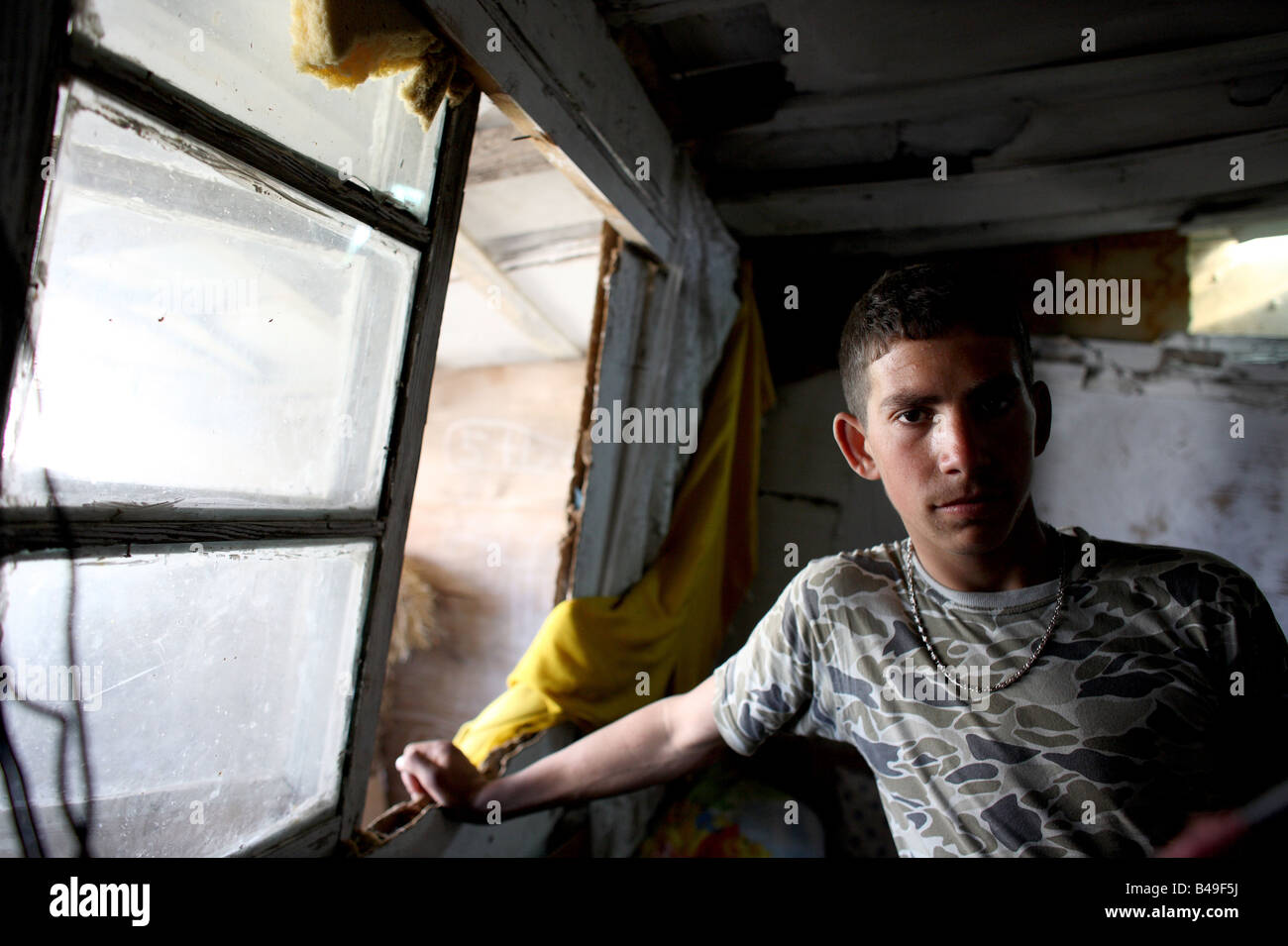 Roma gypsy boy at home in Share, a slum next to a rubbish dump on the ...