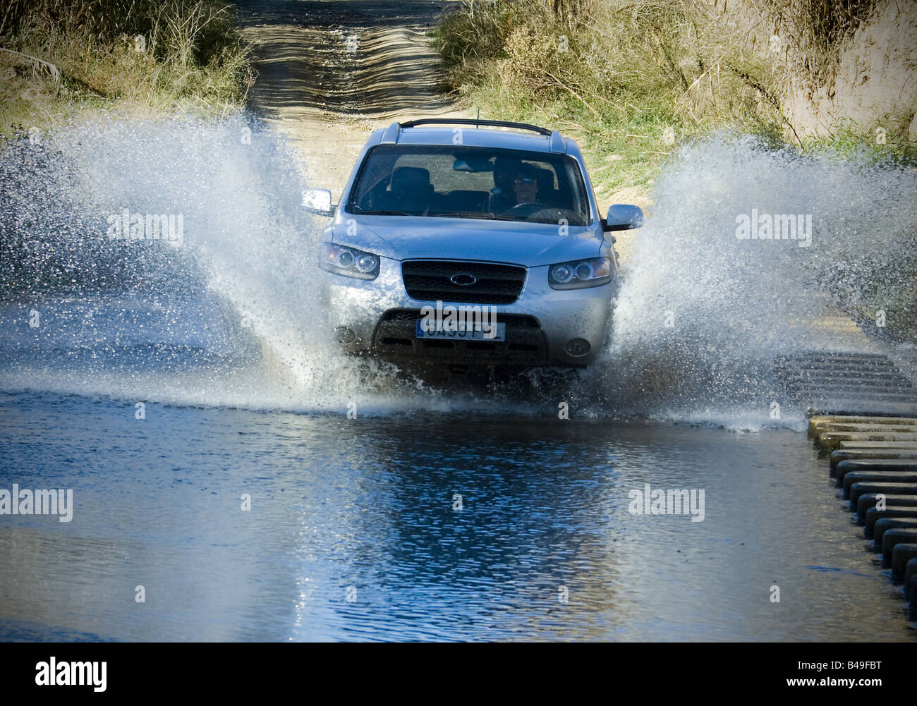 Suv driving on flooded roads hi-res stock photography and images - Alamy