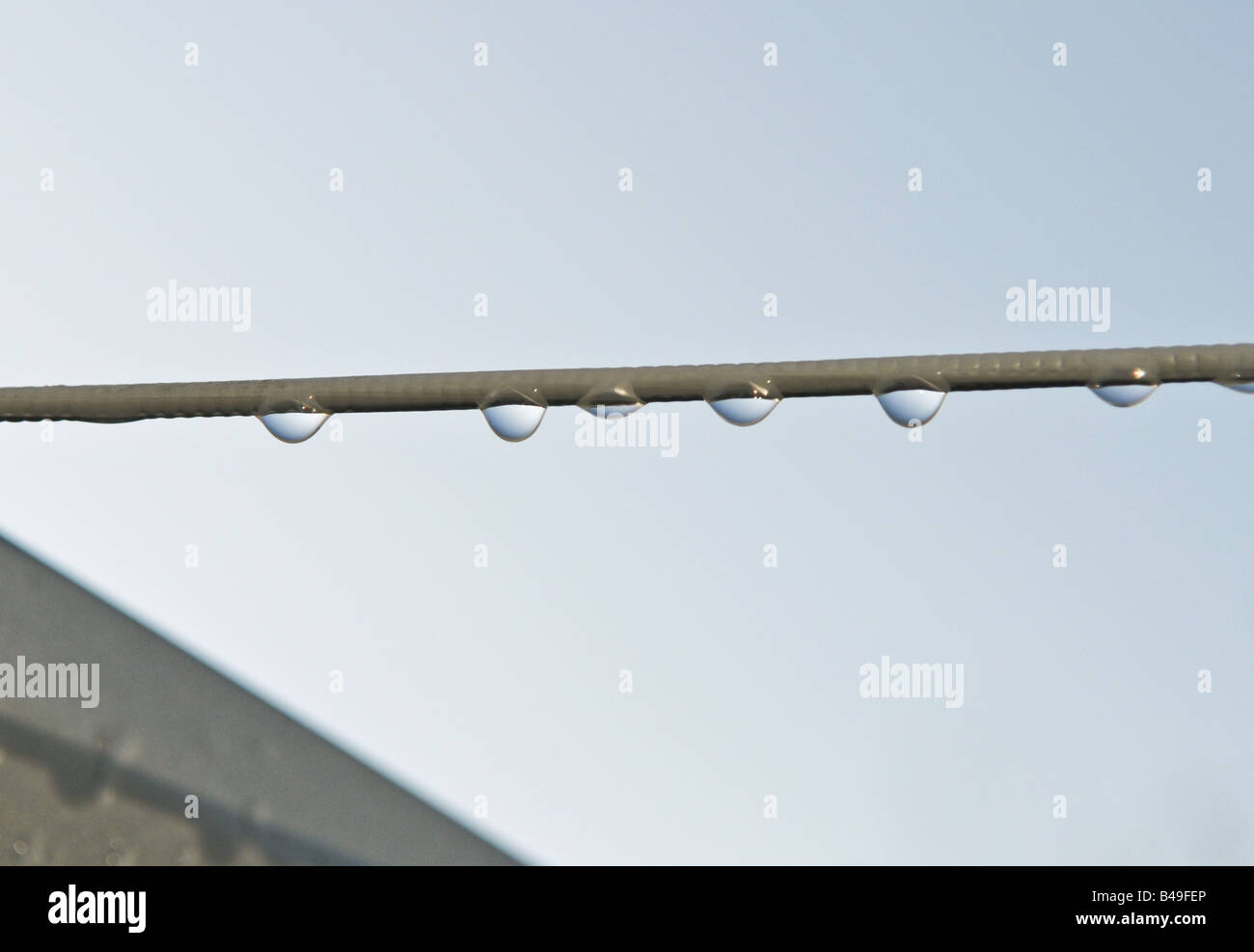 Morning dew on a washing line Stock Photo - Alamy