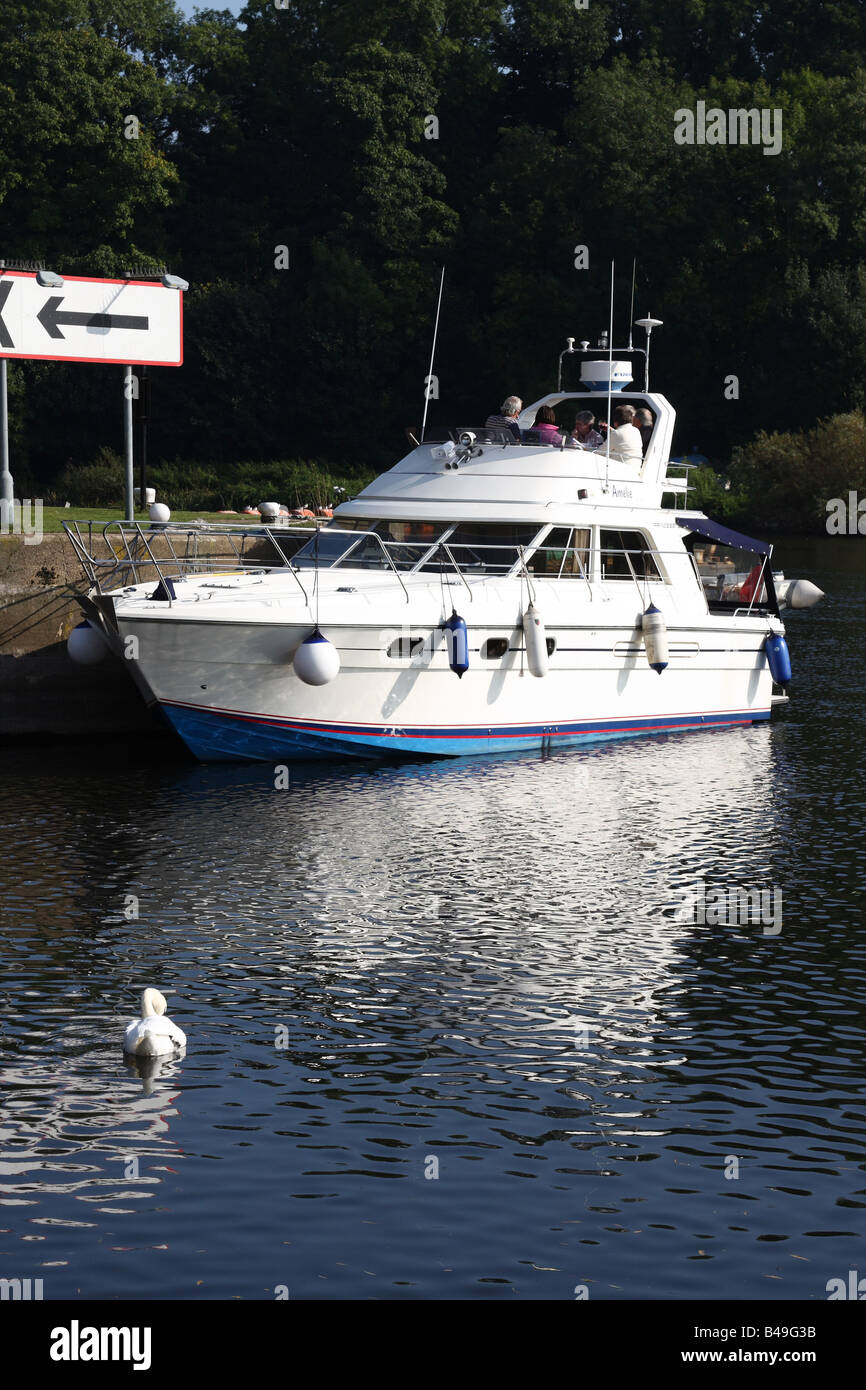 A cabin cruiser on the River Trent at Gunthorpe Lock, Gunthorpe ...
