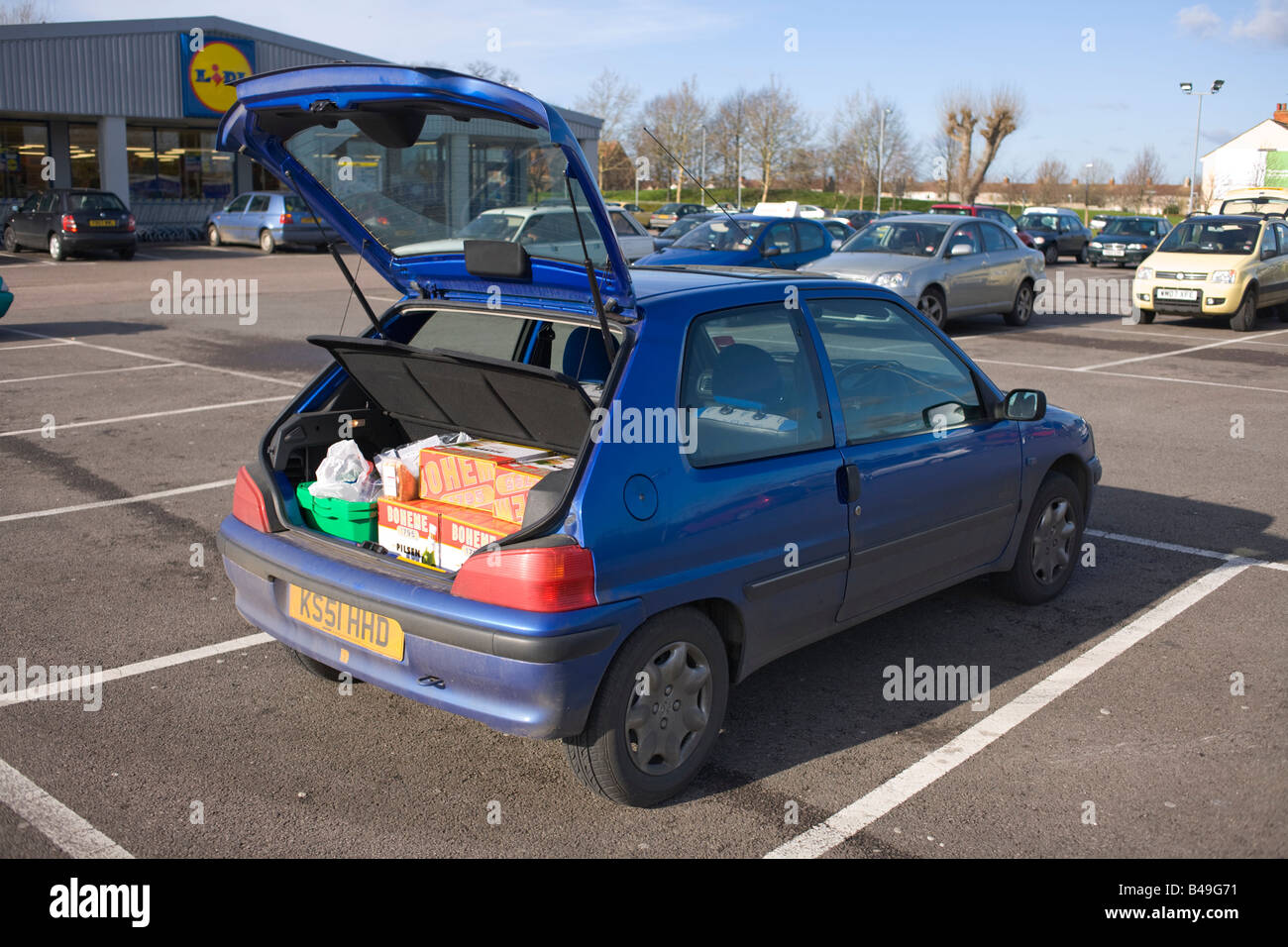 Lidl Supermarket Swindon peugeot 106 with boot trunk full of beer Stock ...