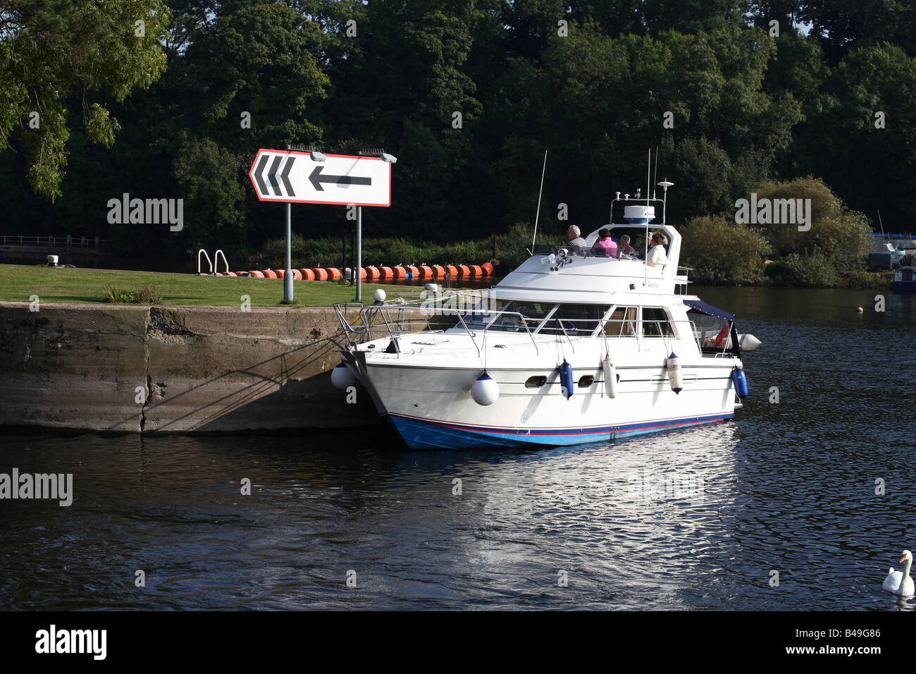 A cabin cruiser on the River Trent at Gunthorpe Lock, Gunthorpe ...