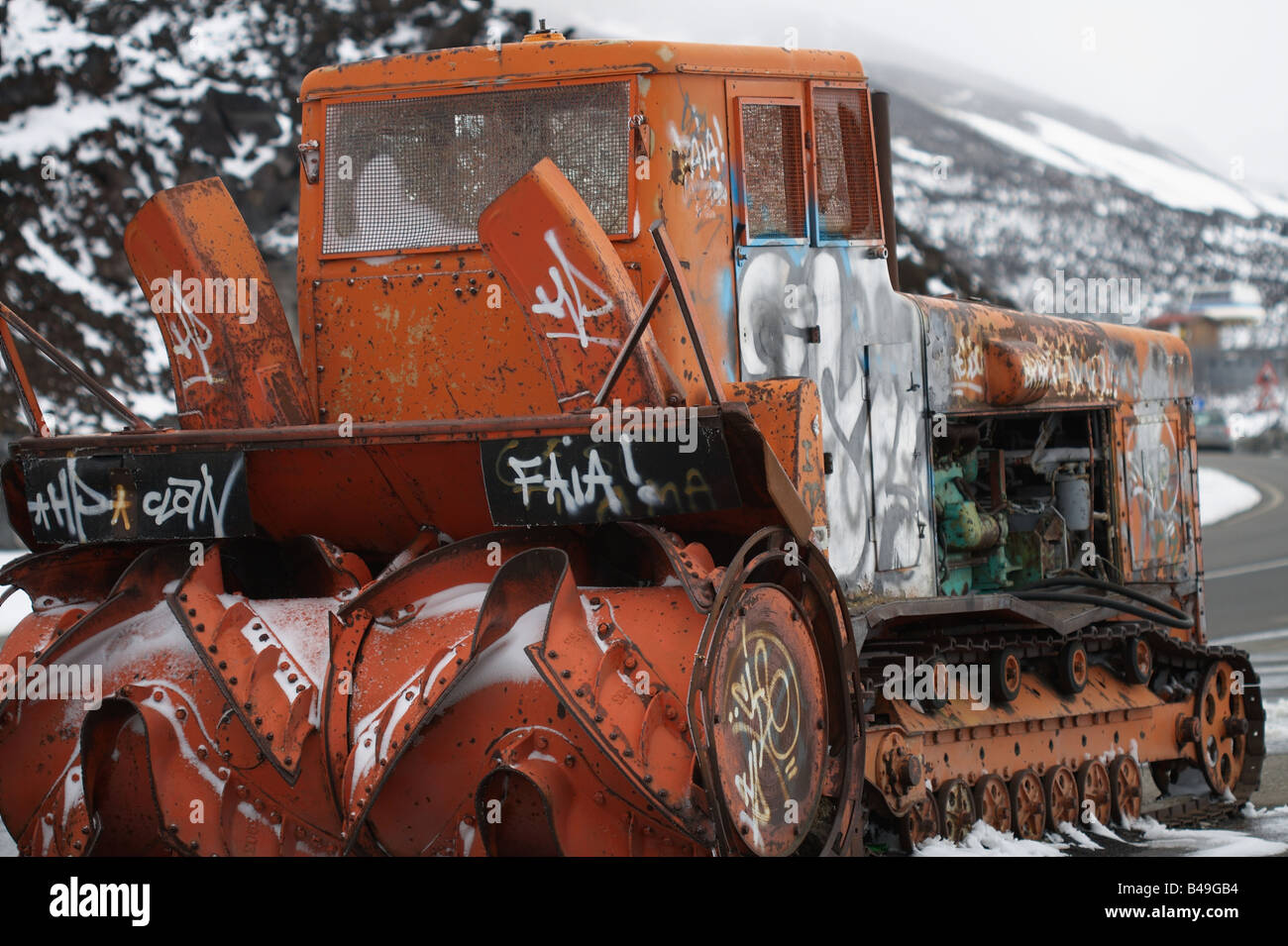 Old red snow crawler Stock Photo - Alamy