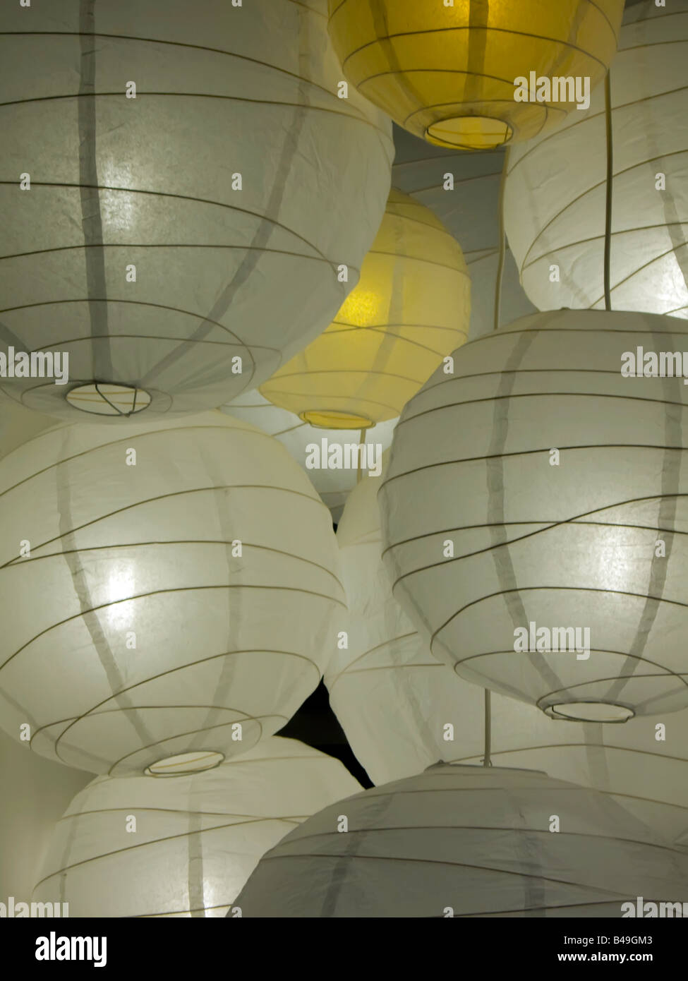 Group of spherical pendant lamps with shades of rice paper Stock Photo ...