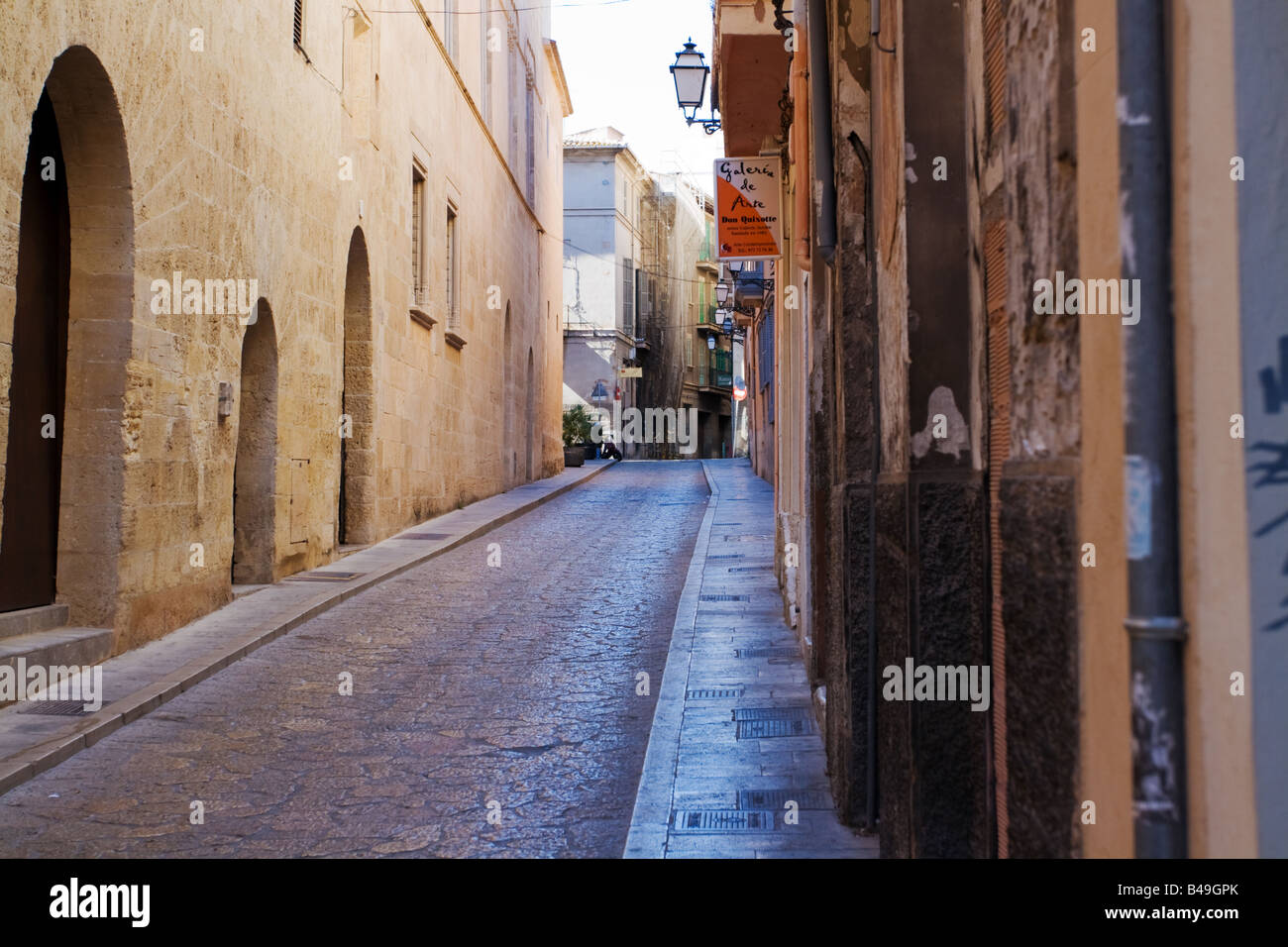 Long, narrow street in Gothic quarter of Palma Mallorca Stock Photo - Alamy