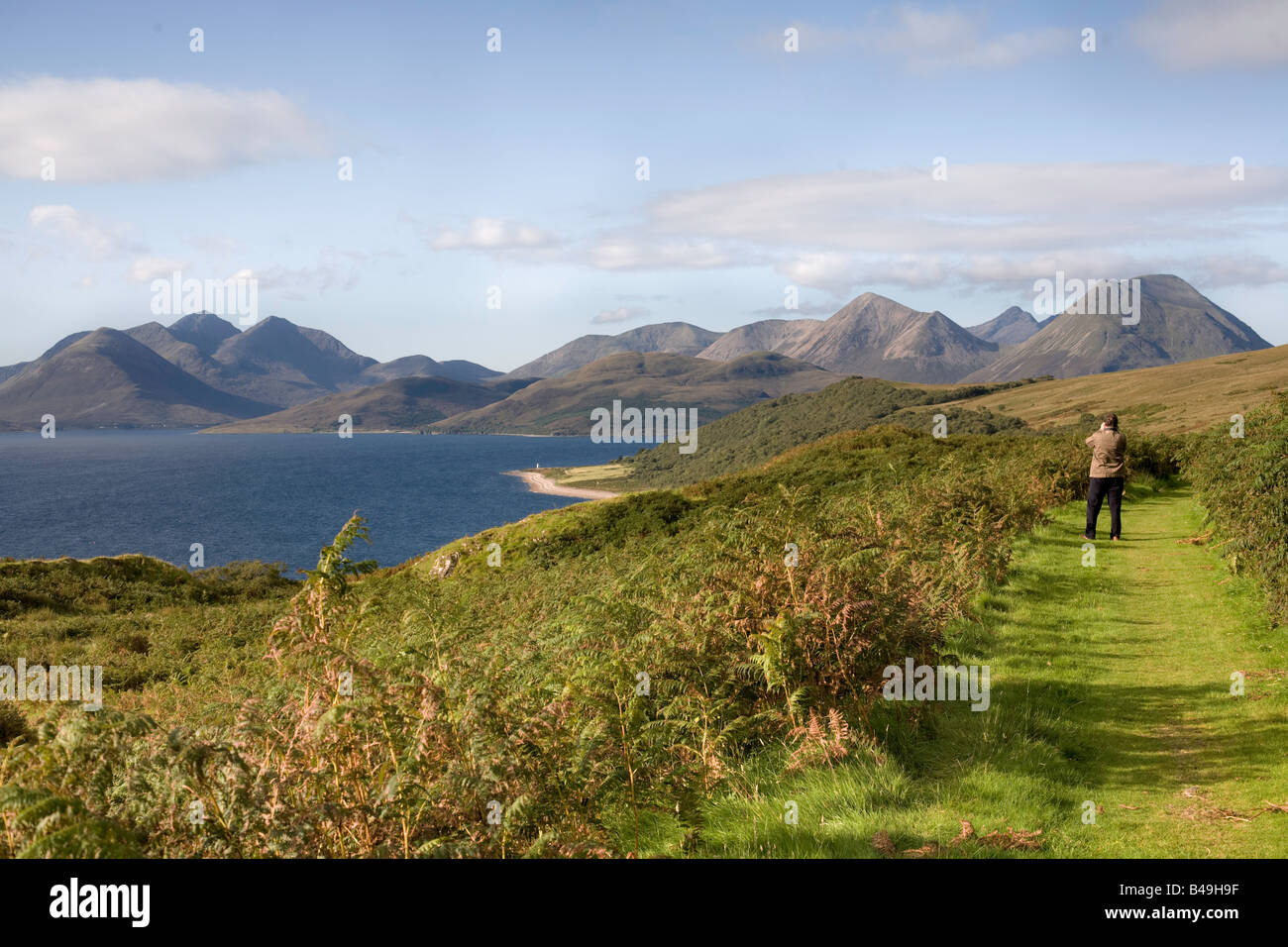 Sightseeing man on the footpath to HaIlaig, Isle of Raasay, view ...