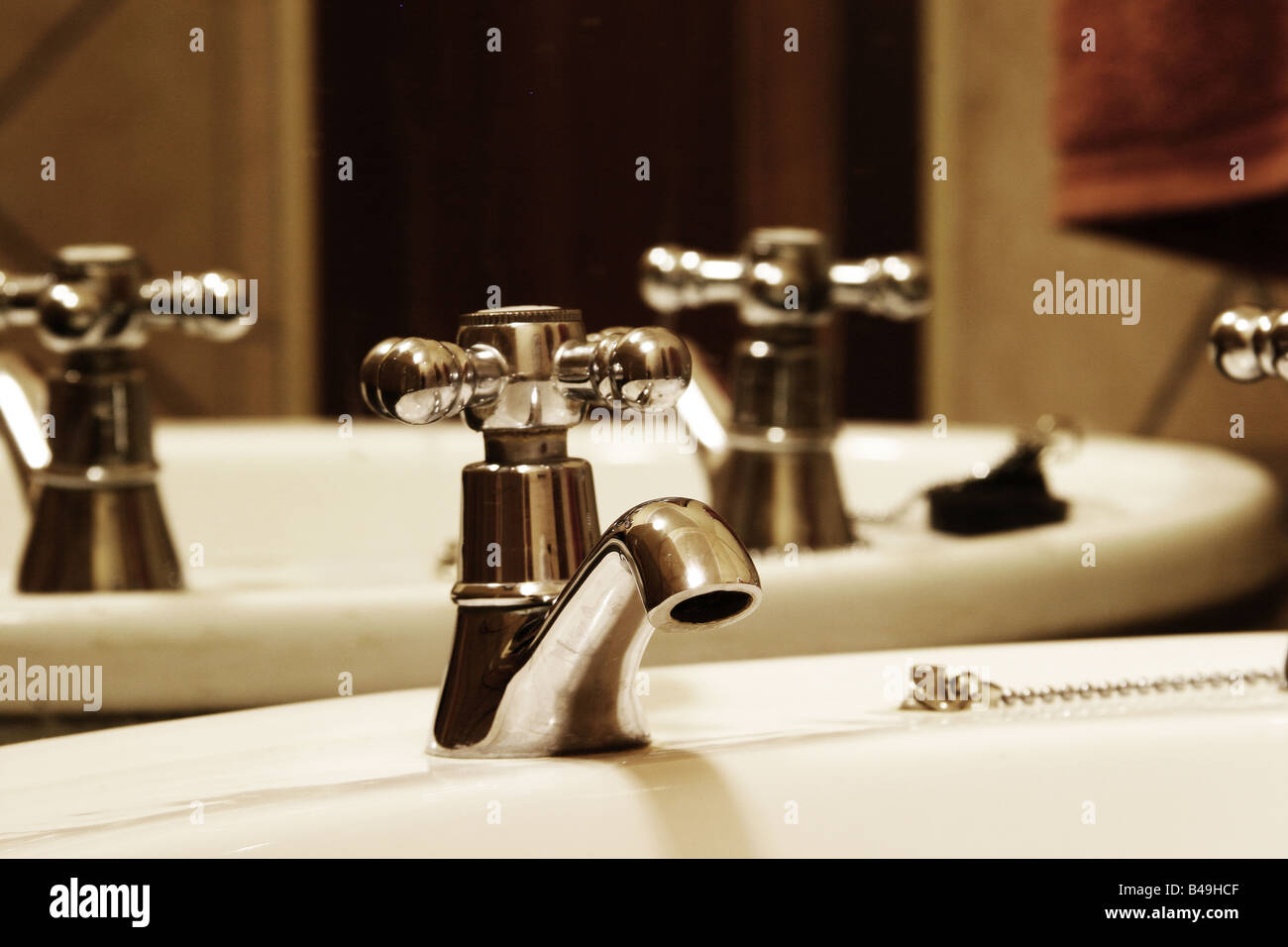 Tap and basin in bathroom Stock Photo - Alamy