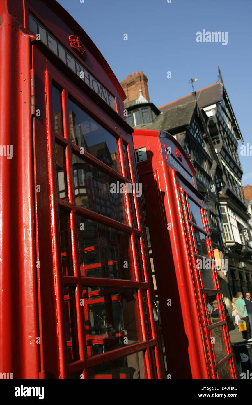 City of Chester, England. Red telephone boxes with Chester’s black and ...