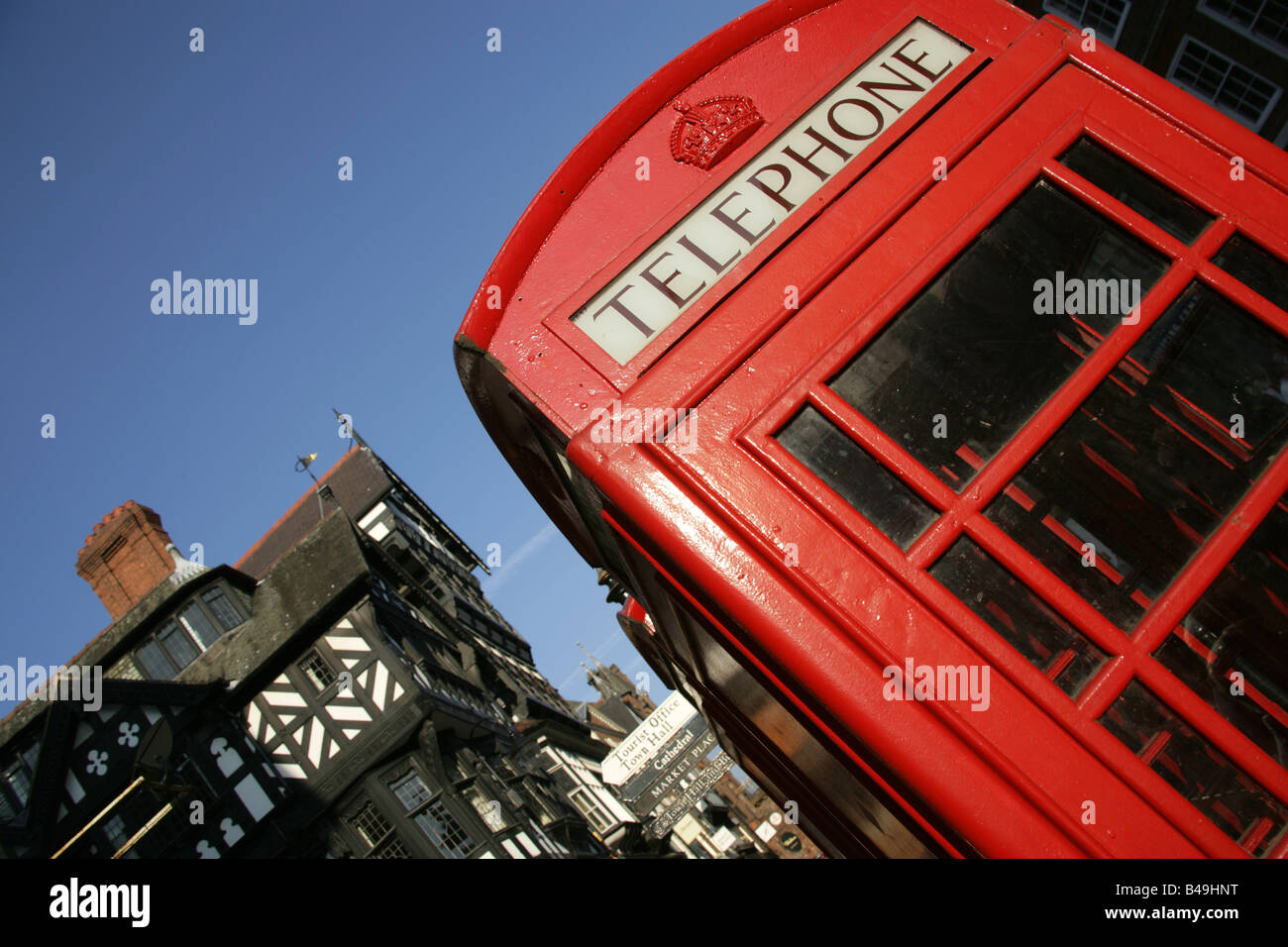 City of Chester, England. Red telephone boxes with Chester’s black and ...