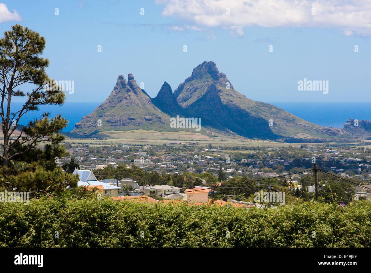 A scenic view of the ocean and an extinct volcano in Mauritius Stock ...