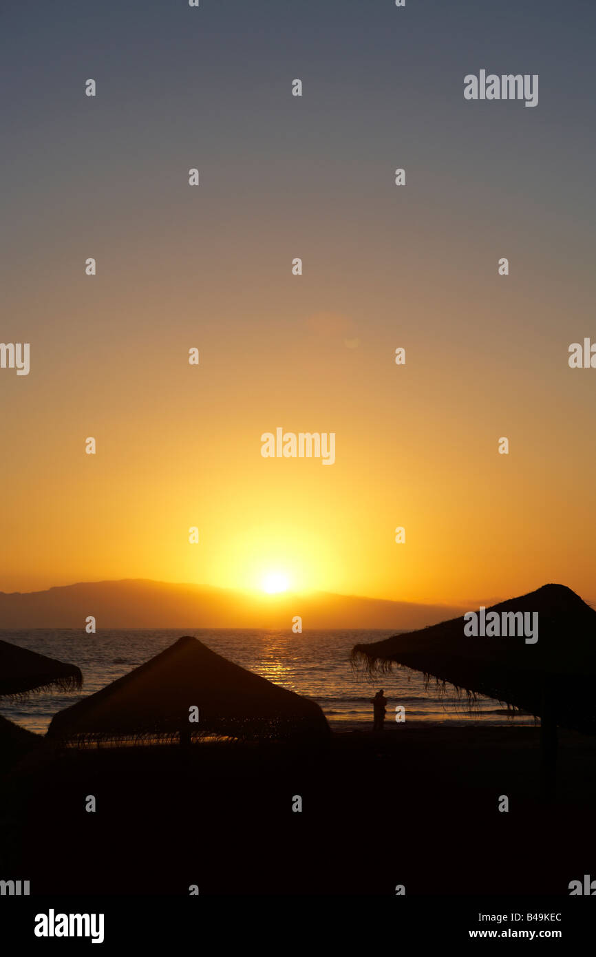 Sunset over tenerife beach Stock Photo - Alamy