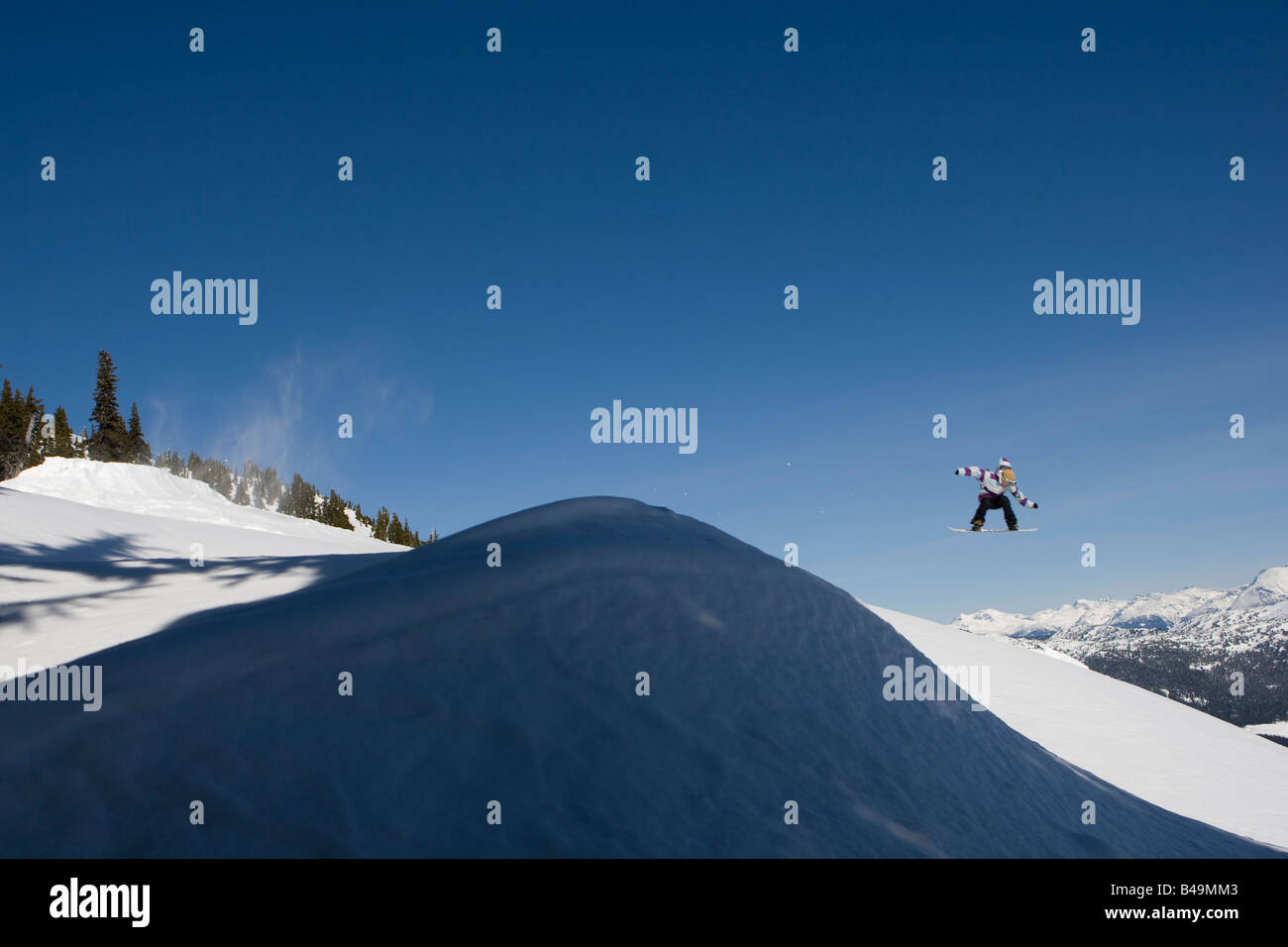 Snowboarder extreme jump in hi-res stock photography and images - Alamy